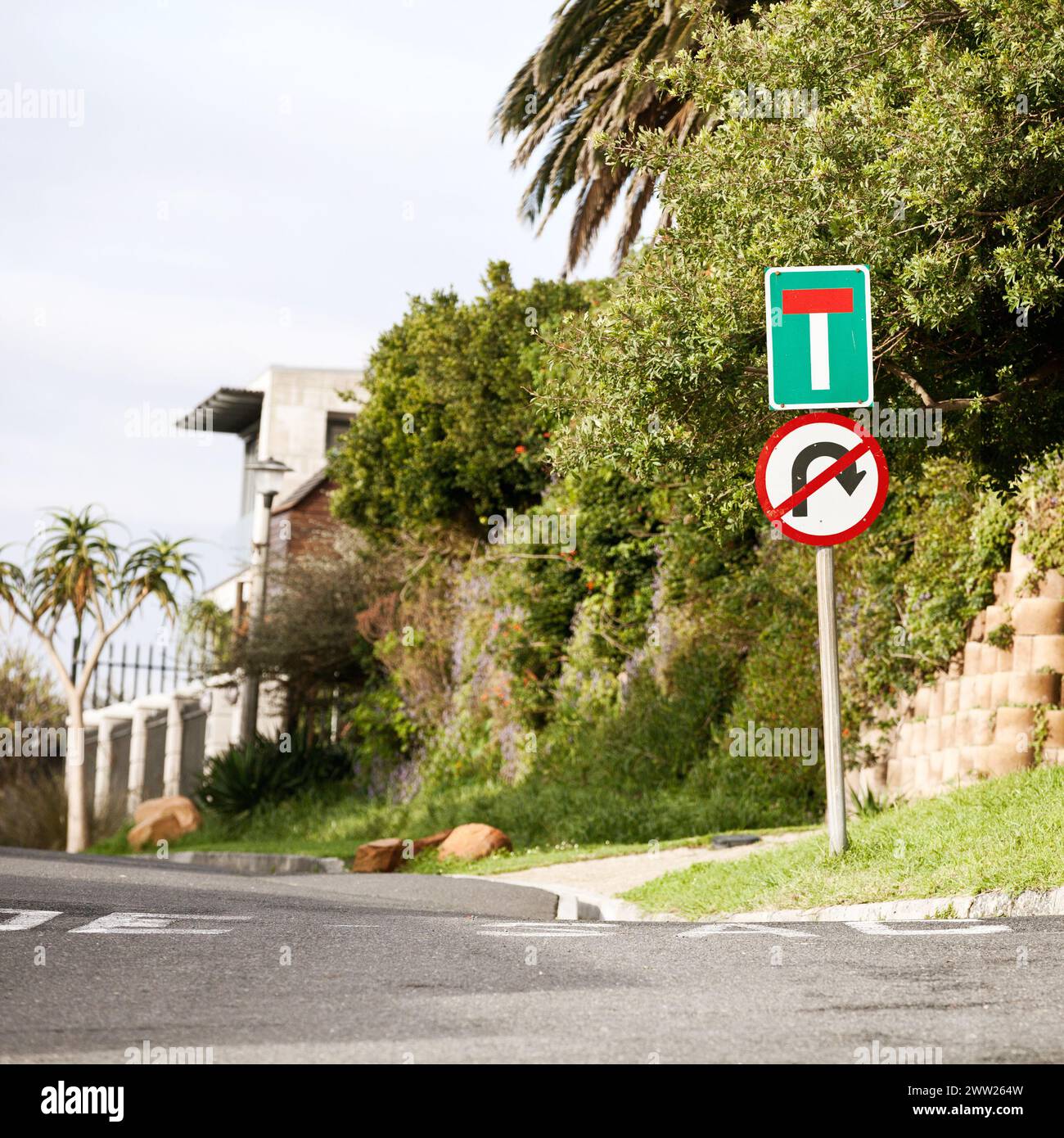 Road sign, warning and signage in street for dead end with caution ...