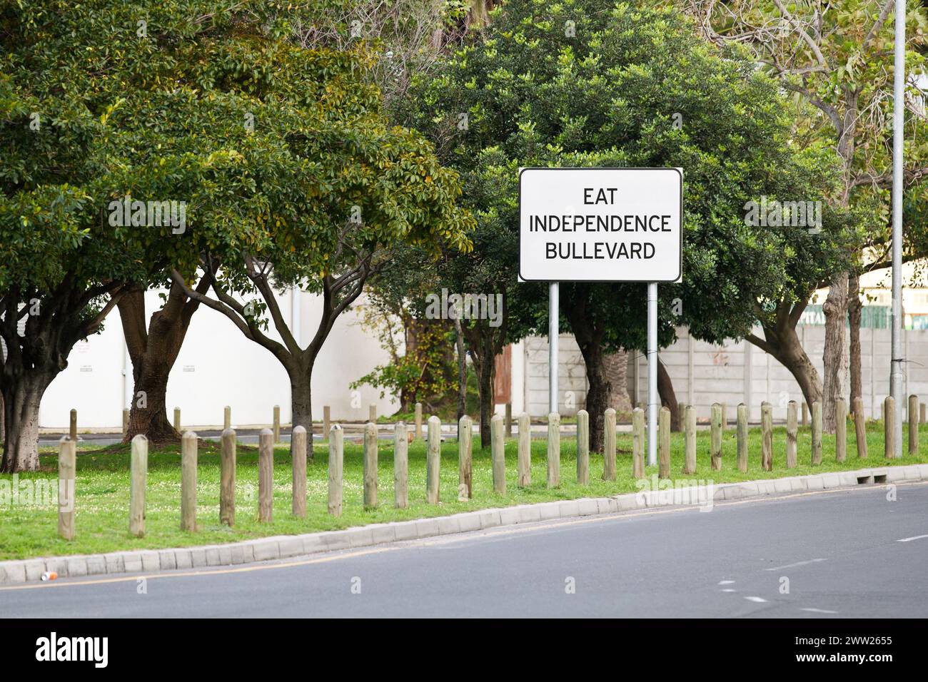Road sign, destination and signage in street for location with place ...