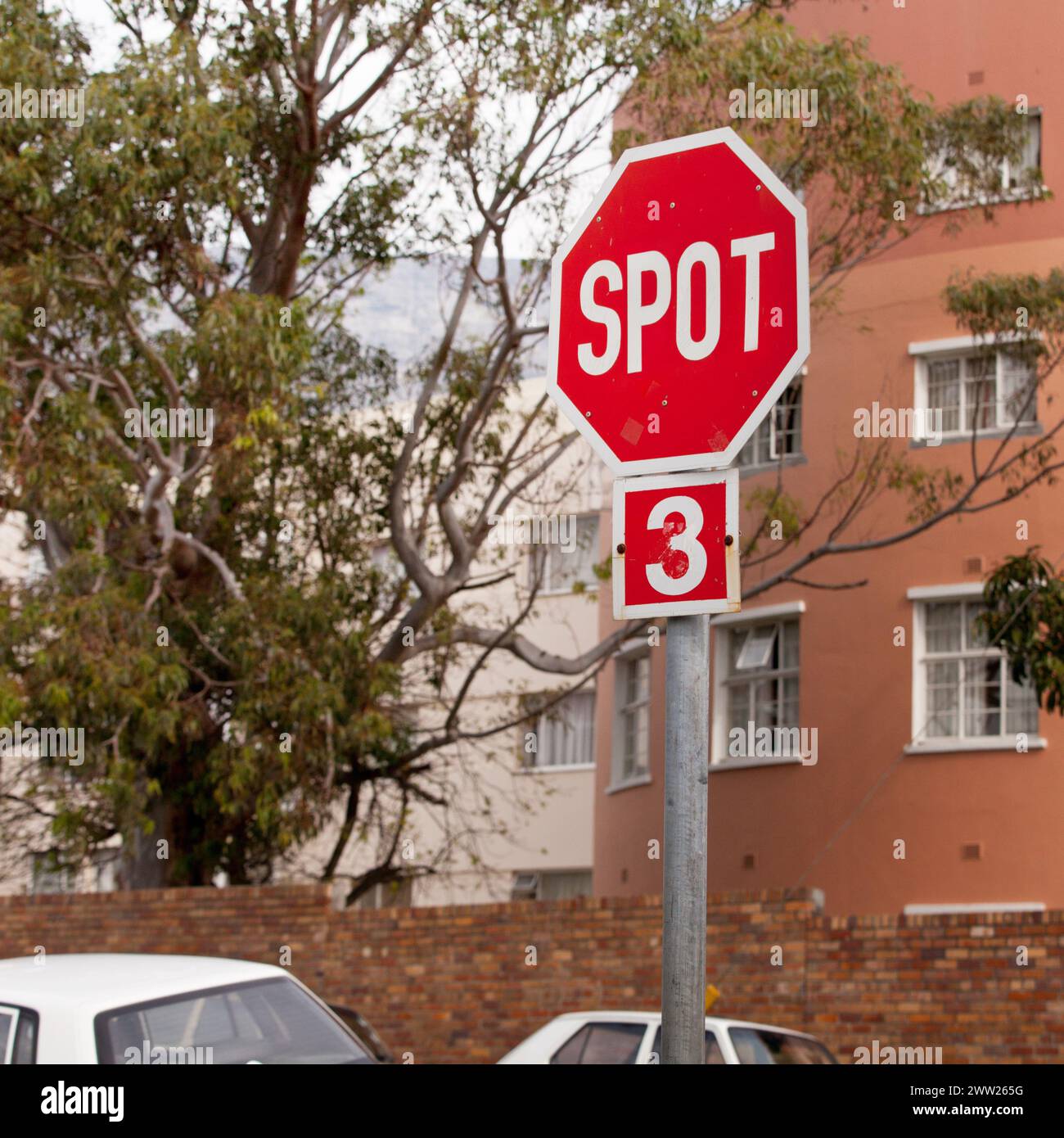 Road, city and outdoor with stop sign, mistake or typo for humor with ...
