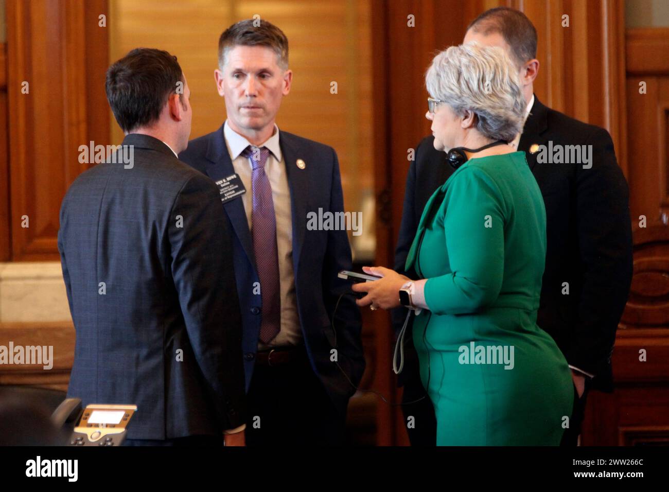 Kansas state Rep. Steve Howe, center, R-Salina, confers with House ...