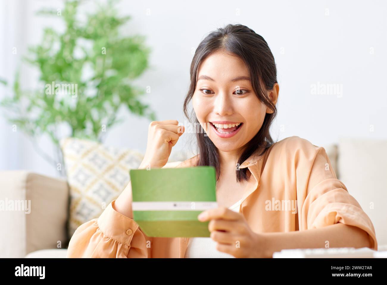 One smiling with clenched fist hi-res stock photography and images - Alamy