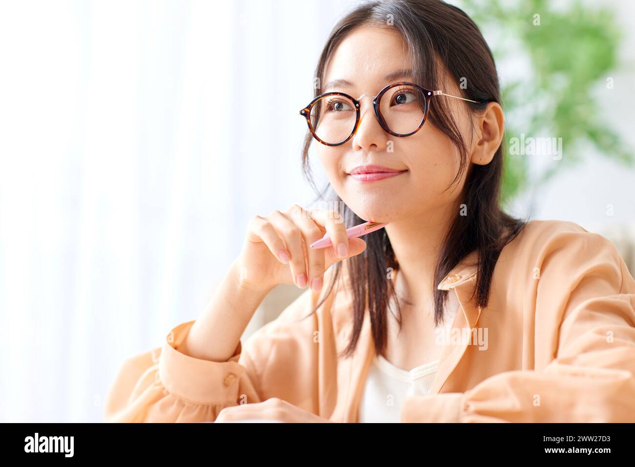 Asian glasses hi-res stock photography and images - Alamy