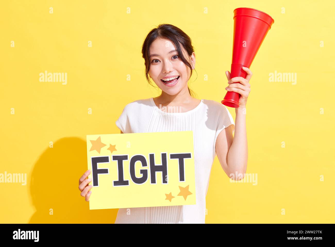 Woman holding fight sign hi-res stock photography and images - Alamy