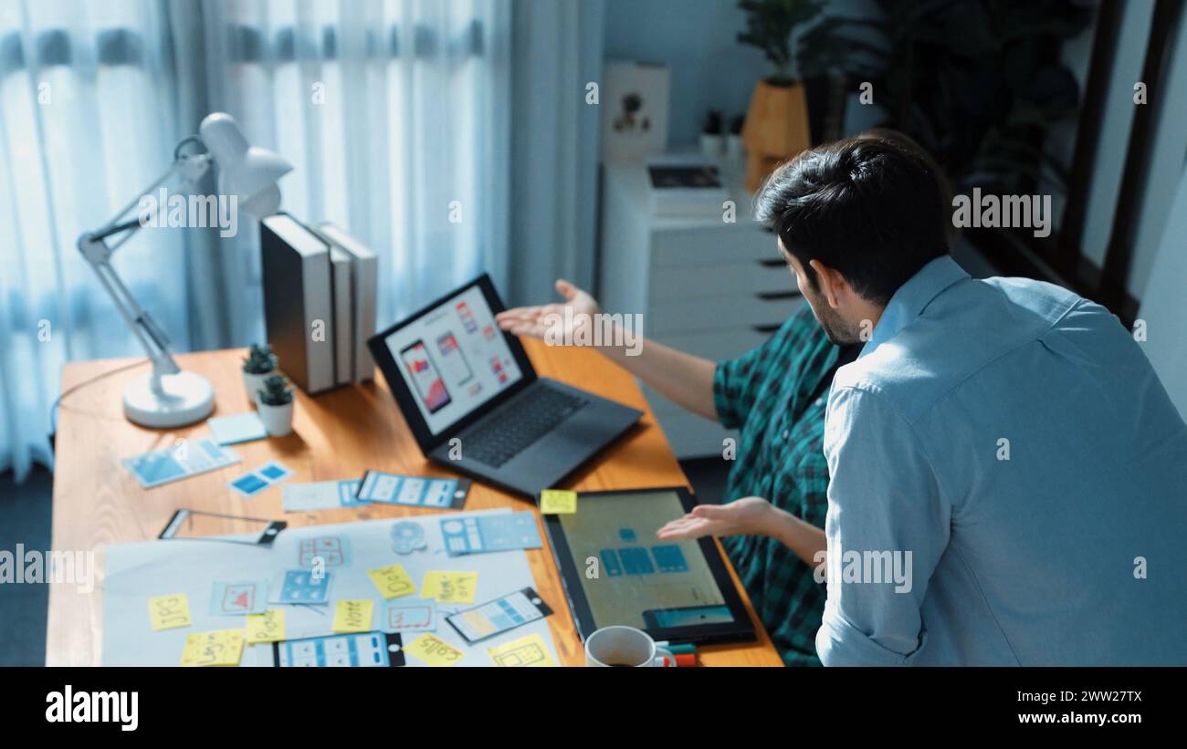 Top view of smart developer compare Ux Ui design and planning for ...