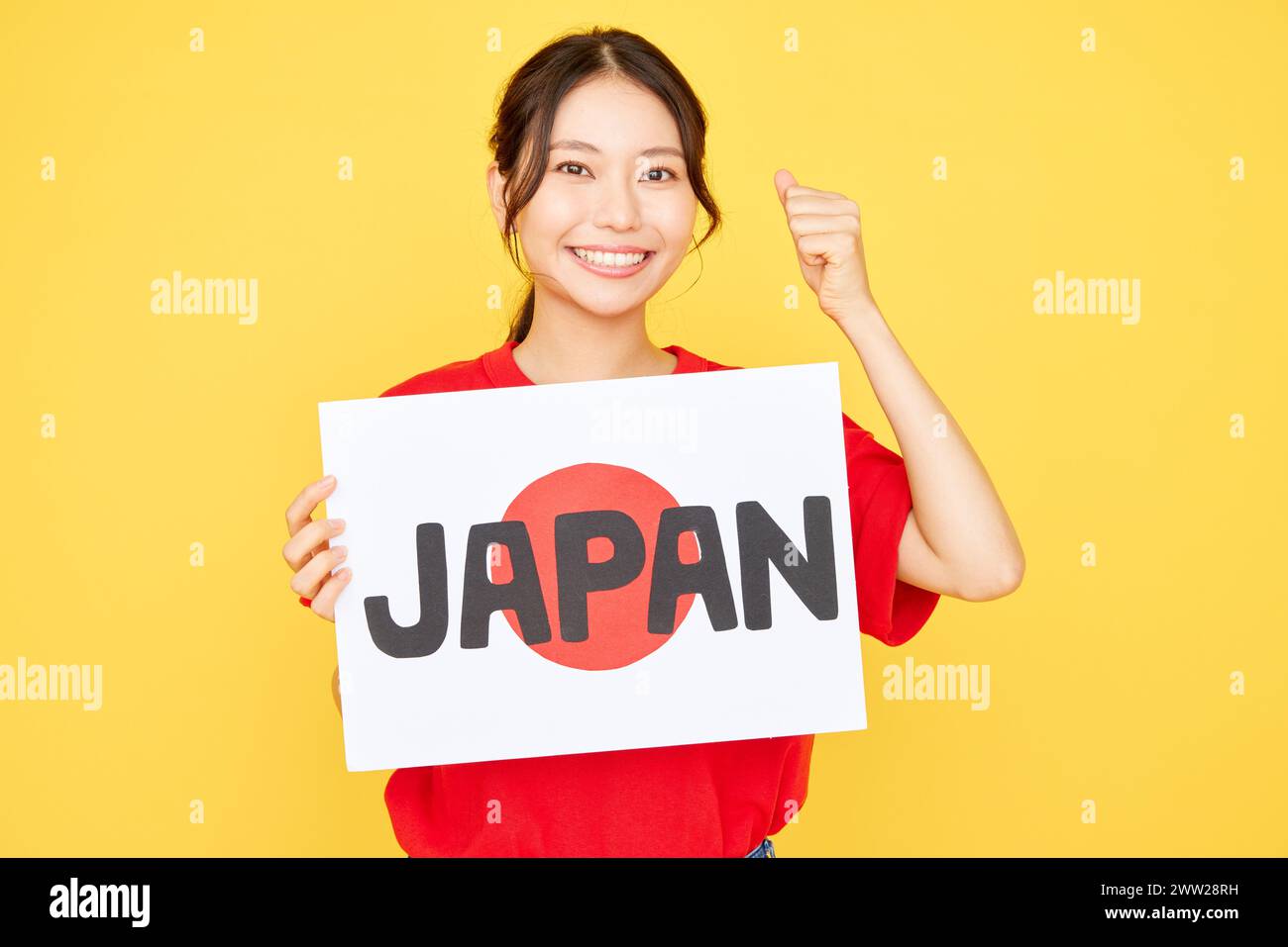 Asian woman holding Japan sign Stock Photo - Alamy