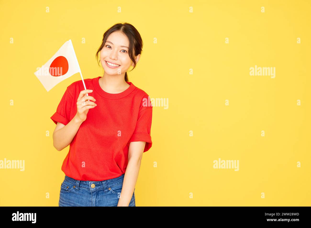 Holding japanese flag hi-res stock photography and images - Alamy