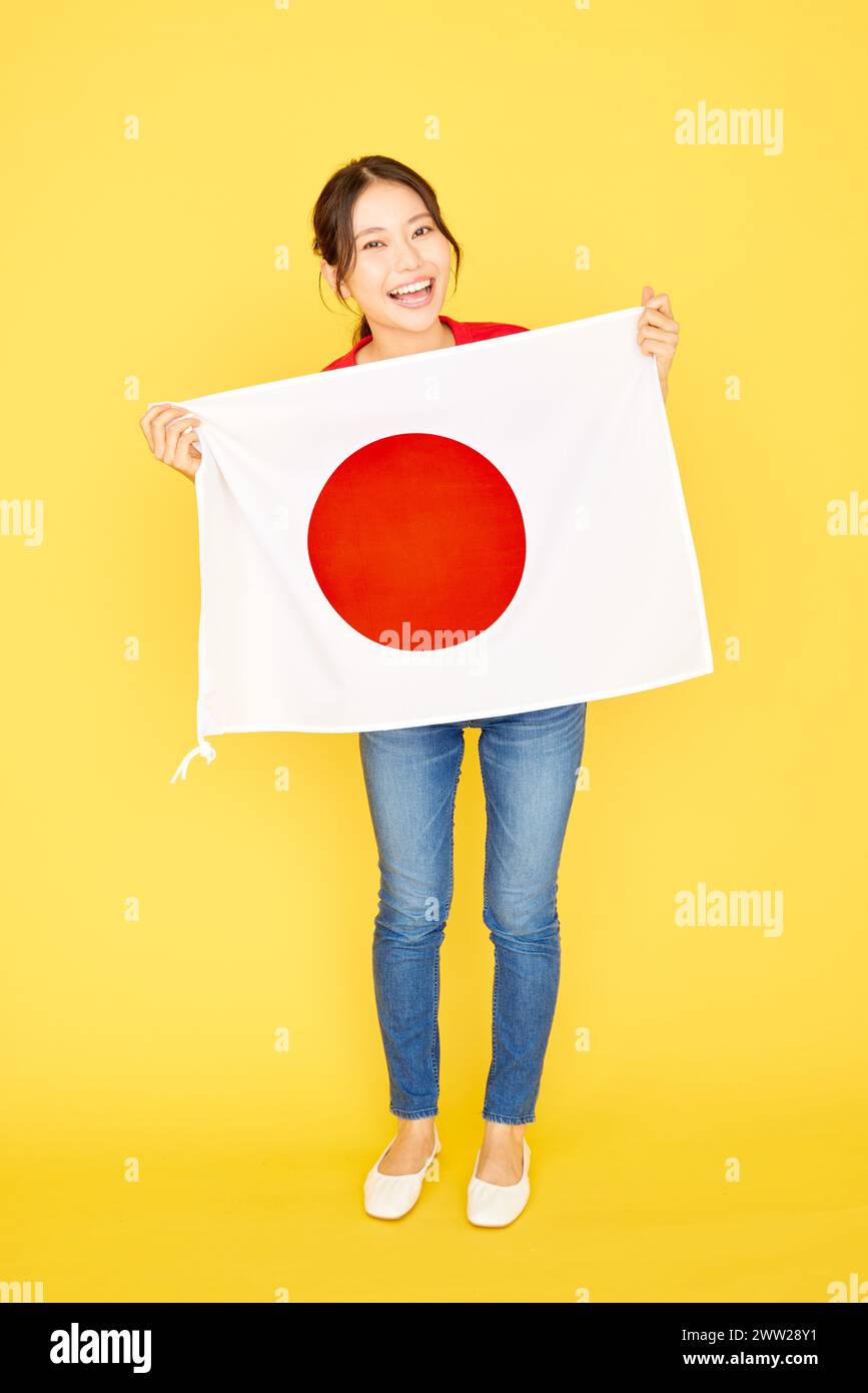 Holding japanese flag hi-res stock photography and images - Alamy