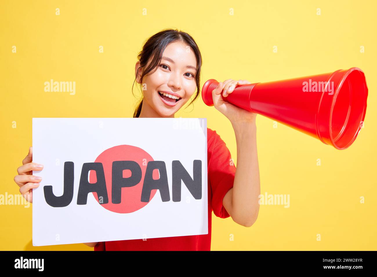 Japanese woman holding whiteboard and megaphone and cheering Stock ...