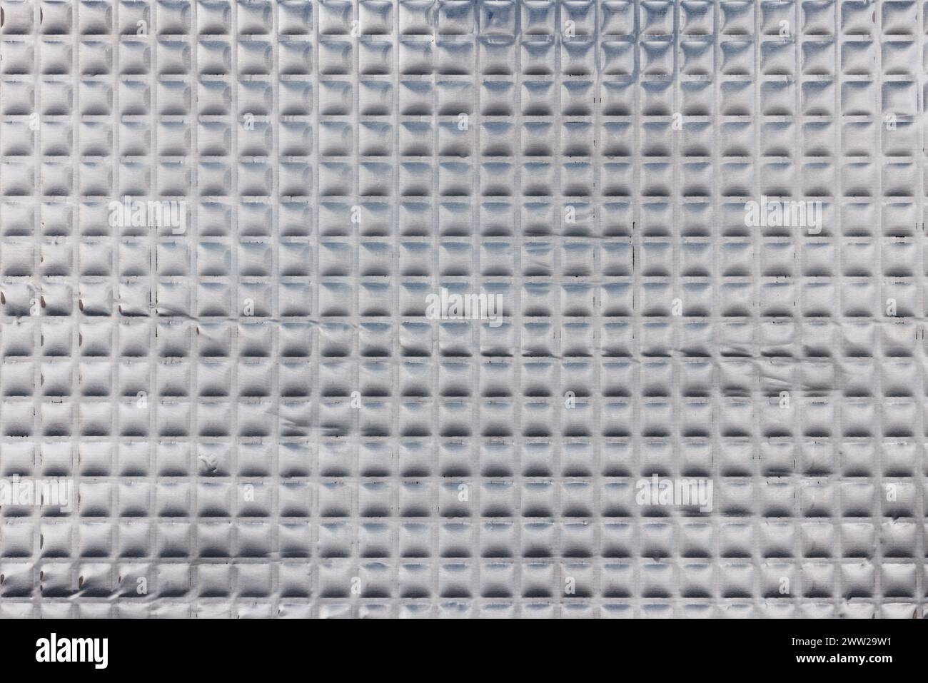 Closeup full-frame background and texture of aluminum coated butil ...