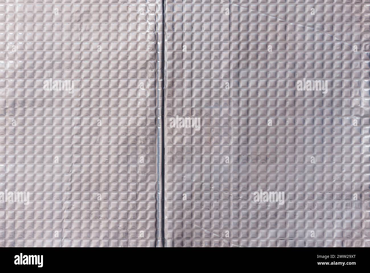 Closeup full-frame background and texture of aluminum coated butil ...