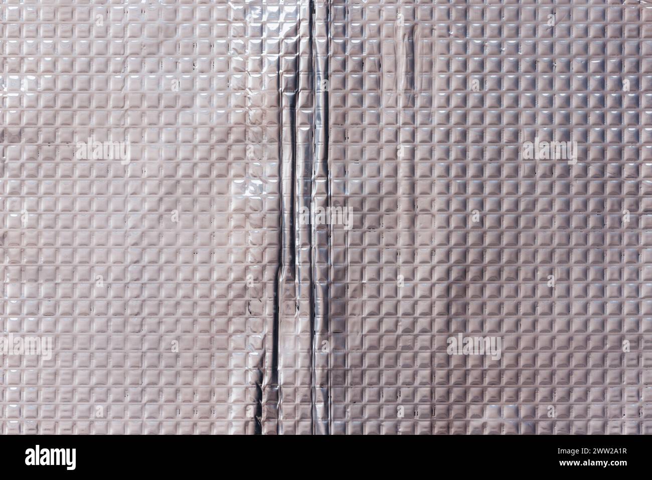 Closeup full-frame background and texture of aluminum coated butil ...