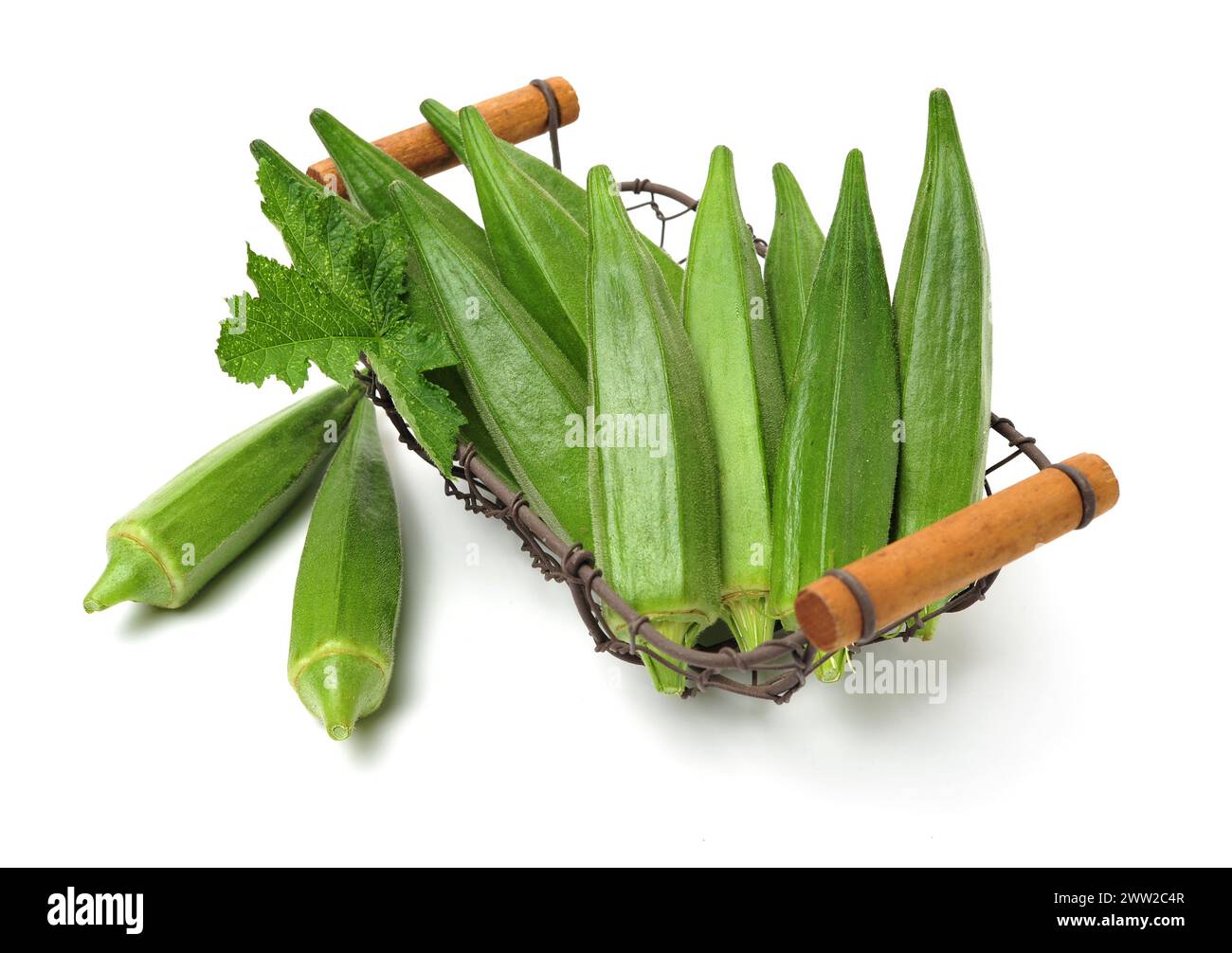 Fresh young okra isolated on white background Stock Photo - Alamy
