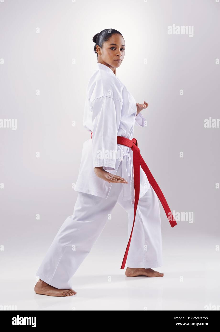 Woman, portrait and karate fitness in studio, warrior and martial arts ...