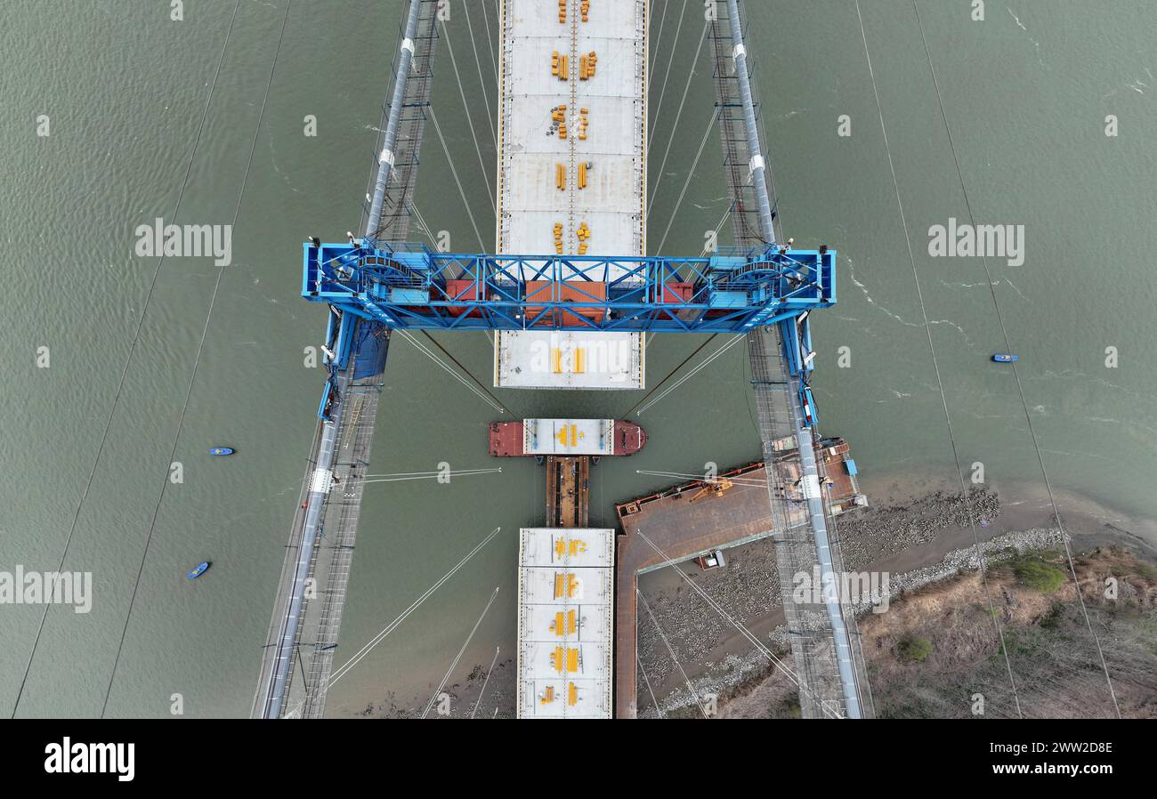 Aerial photo shows the Longtan Yangtze River Bridge under construction ...