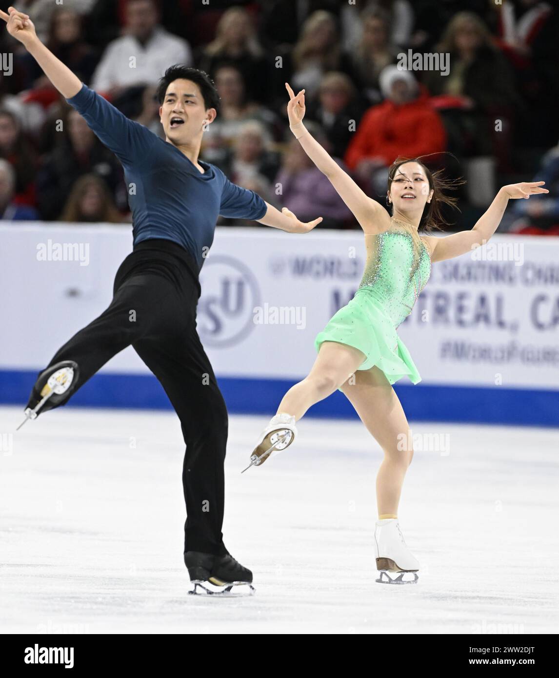 Japan's Riku Miura (R) and Ryuichi Kihara perform in the pairs short ...