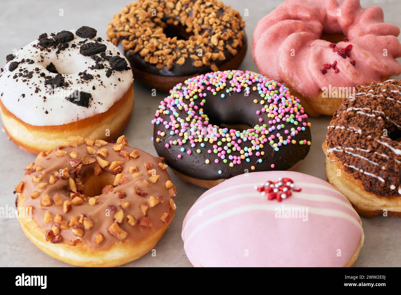 A group of donuts with different toppings Stock Photo - Alamy