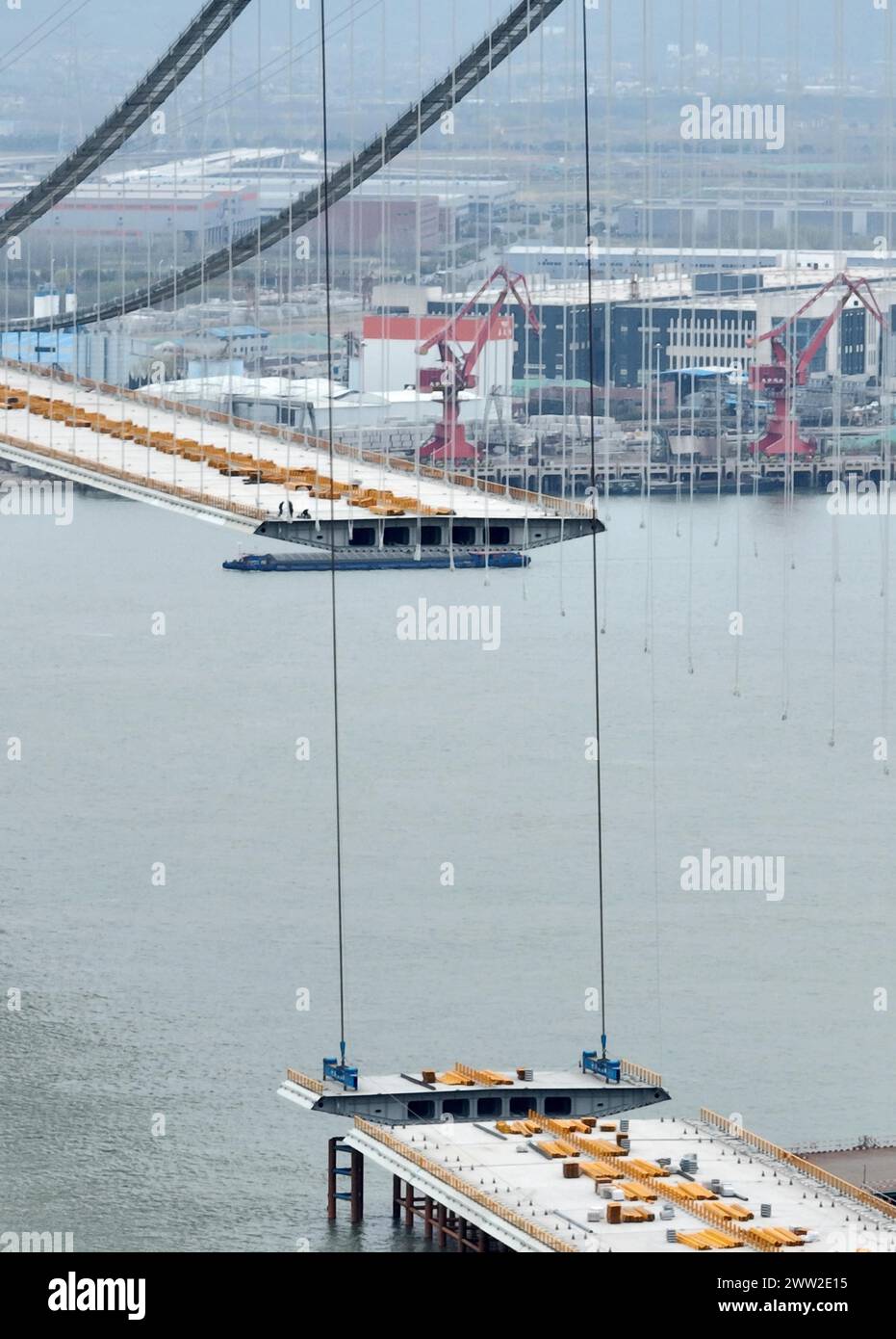 Aerial photo shows the Longtan Yangtze River Bridge under construction ...