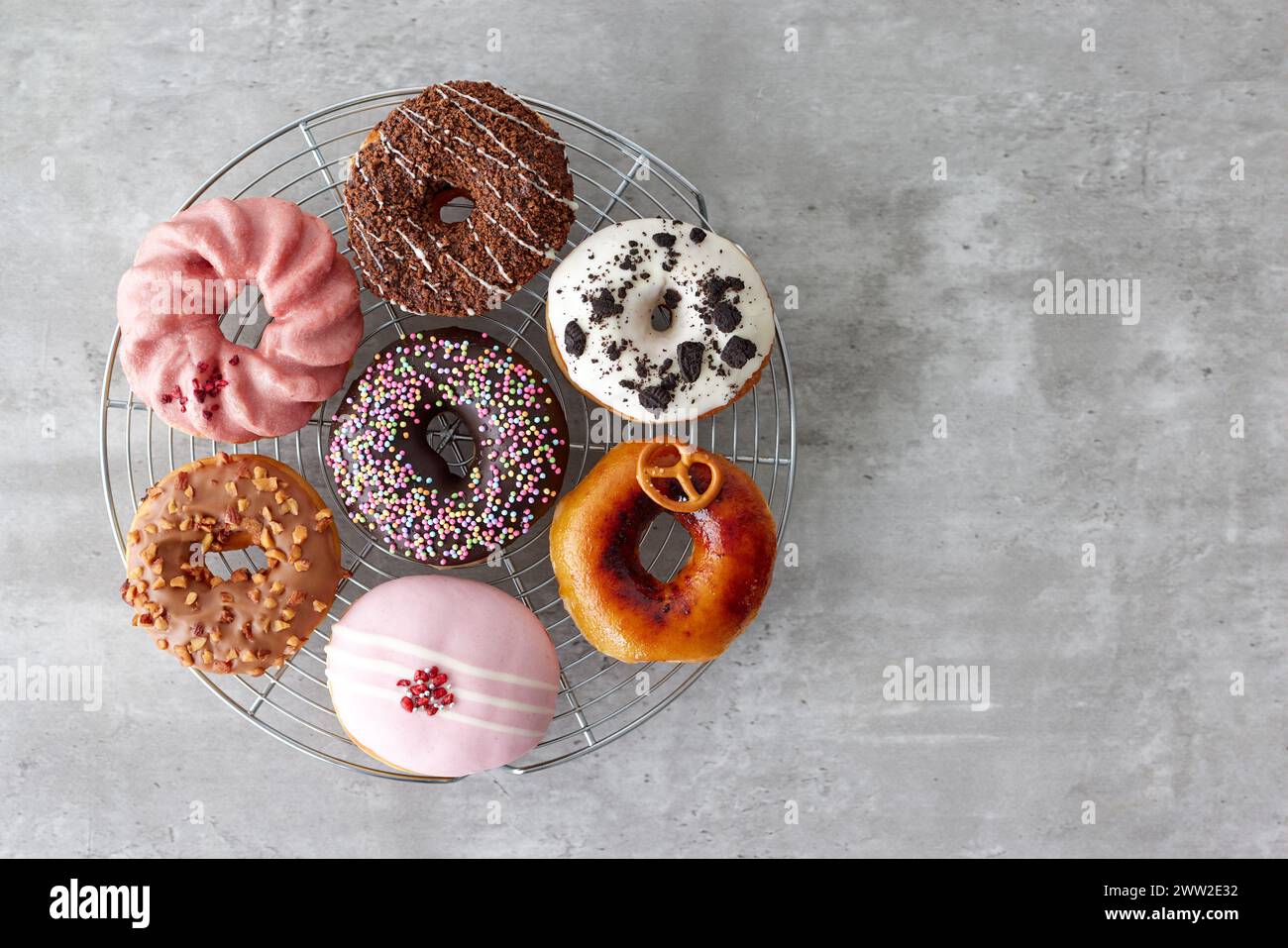 A group of donuts with different toppings Stock Photo - Alamy
