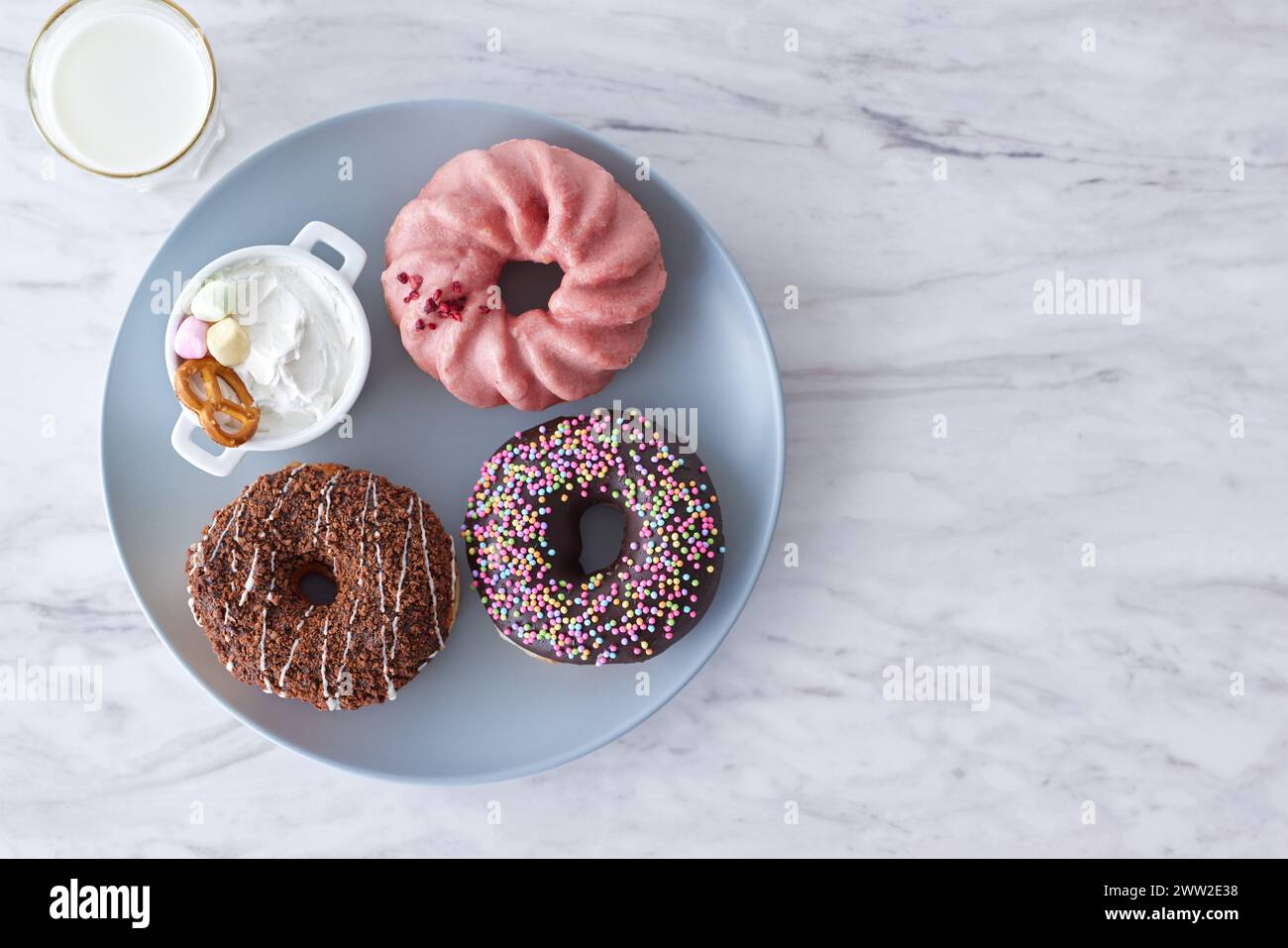 A group of donuts with different toppings Stock Photo - Alamy