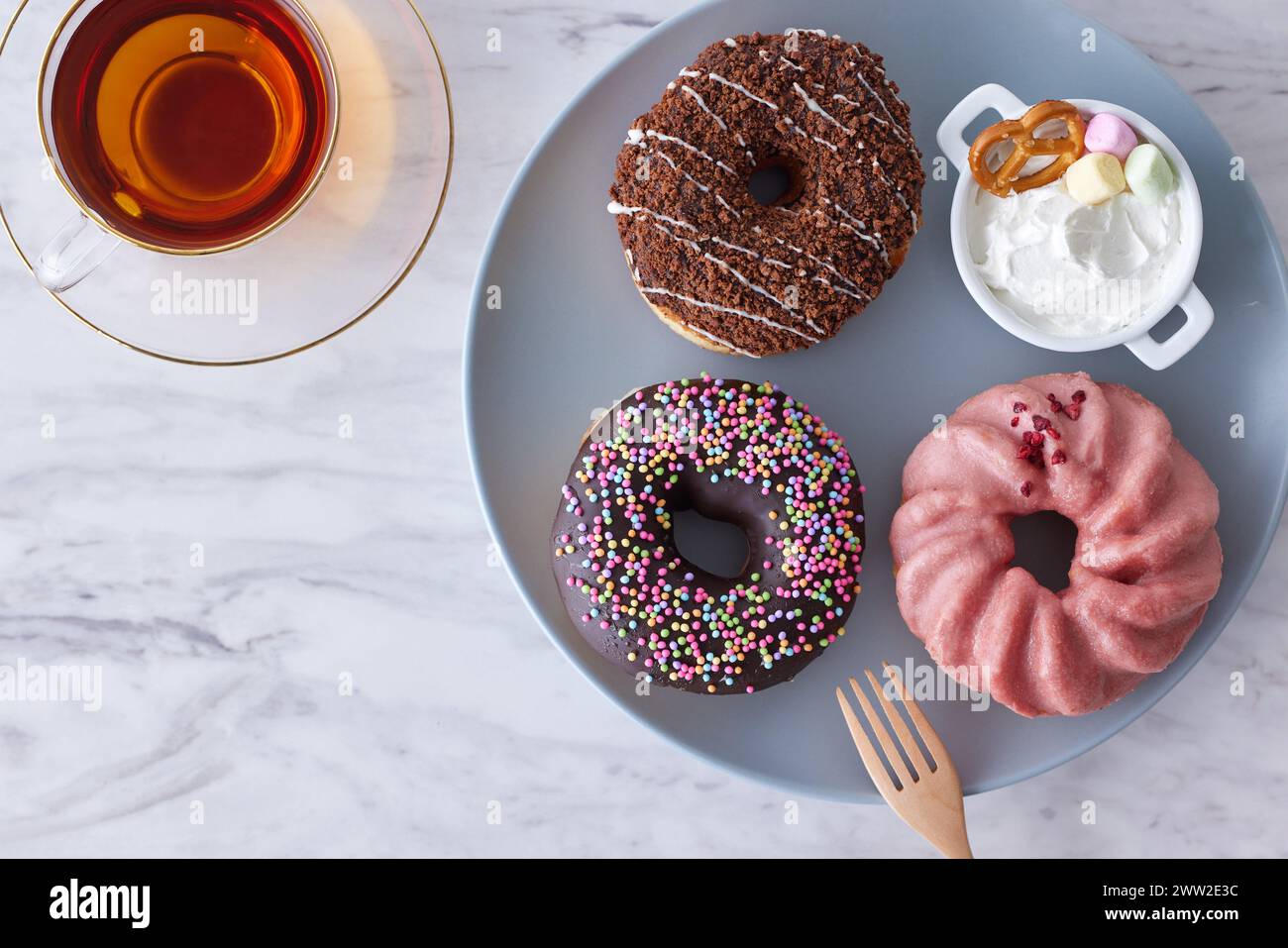 A group of donuts with different toppings Stock Photo - Alamy