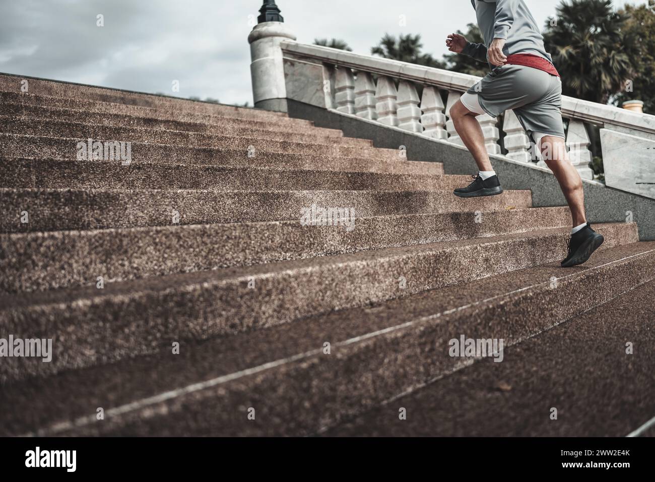 Man running up bridge stairs hi-res stock photography and images - Alamy