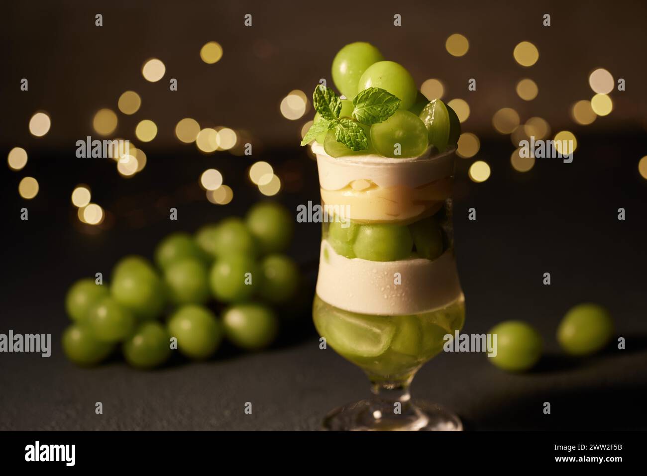 A dessert with green grapes and ice cream Stock Photo - Alamy