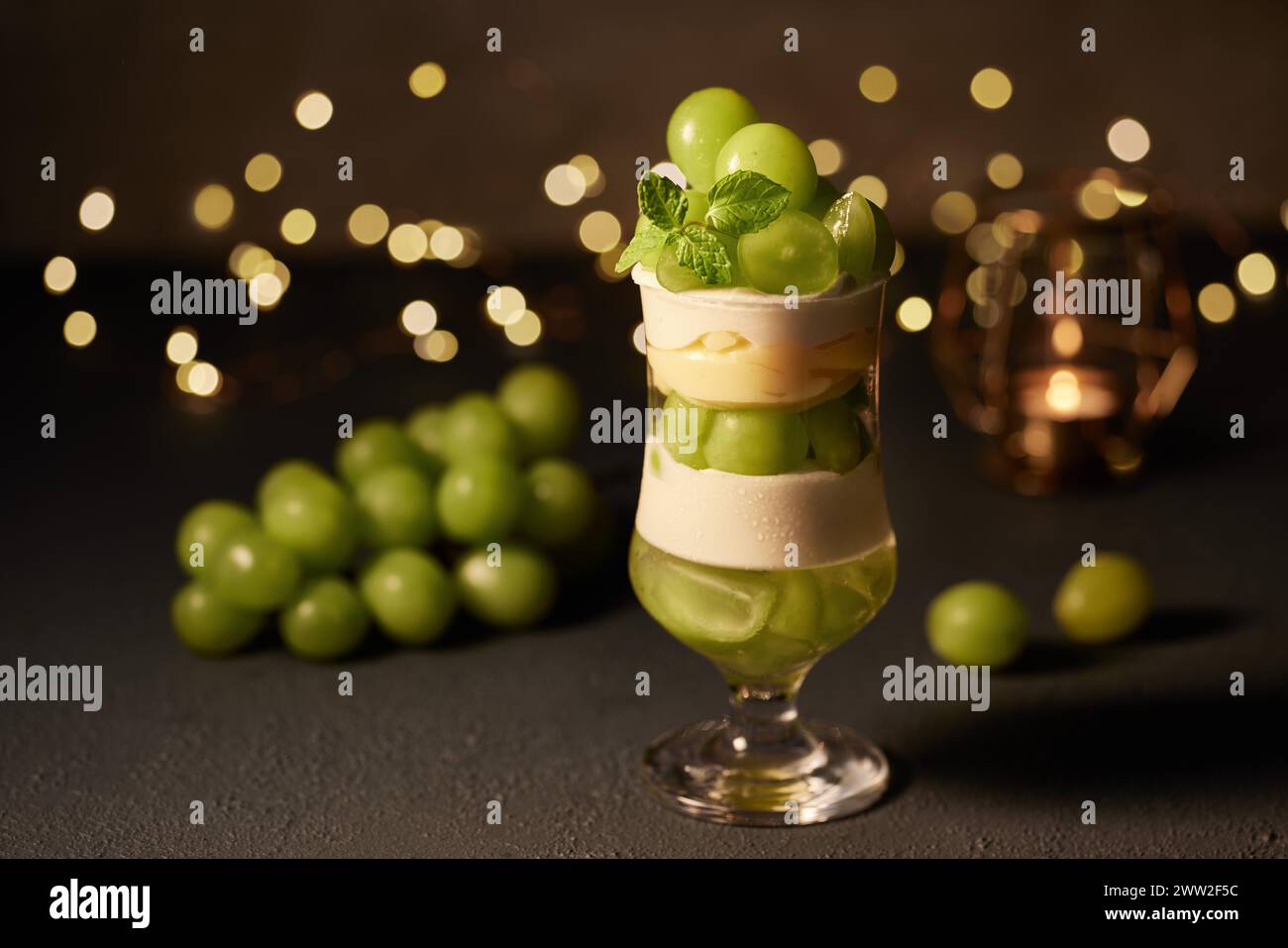 A dessert with green grapes and ice cream Stock Photo - Alamy