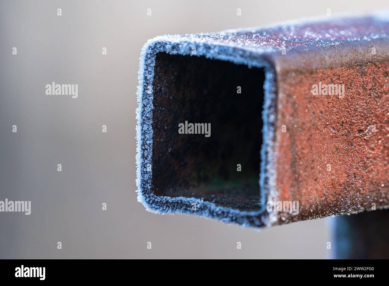 Frosty steel . A frozen metal square edges, blurry background Stock ...