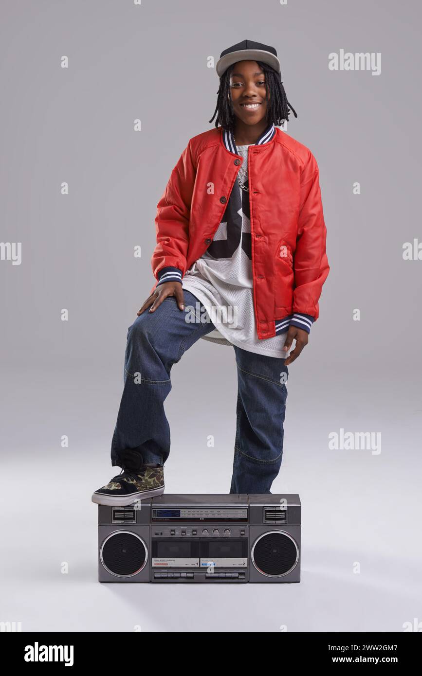 Teen, hip hop and portrait with radio for music and dance in a studio ...