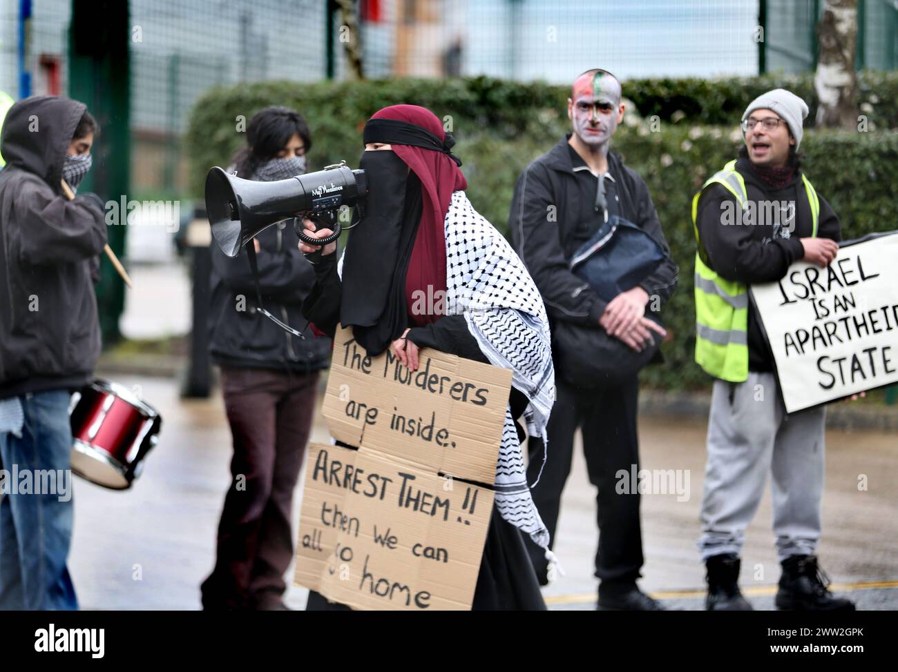 Leicester, UK. 20th Mar, 2024. Protesters with a range of signs ...