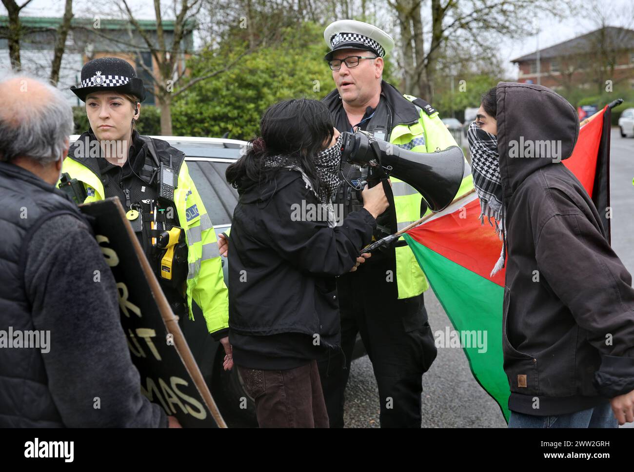 Leicester, UK. 20th Mar, 2024. Police officers encourage protesters ...
