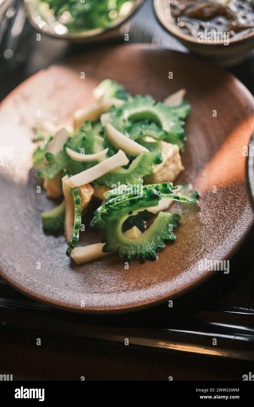Goya, an local Okinawan type of bitter gourd Stock Photo - Alamy
