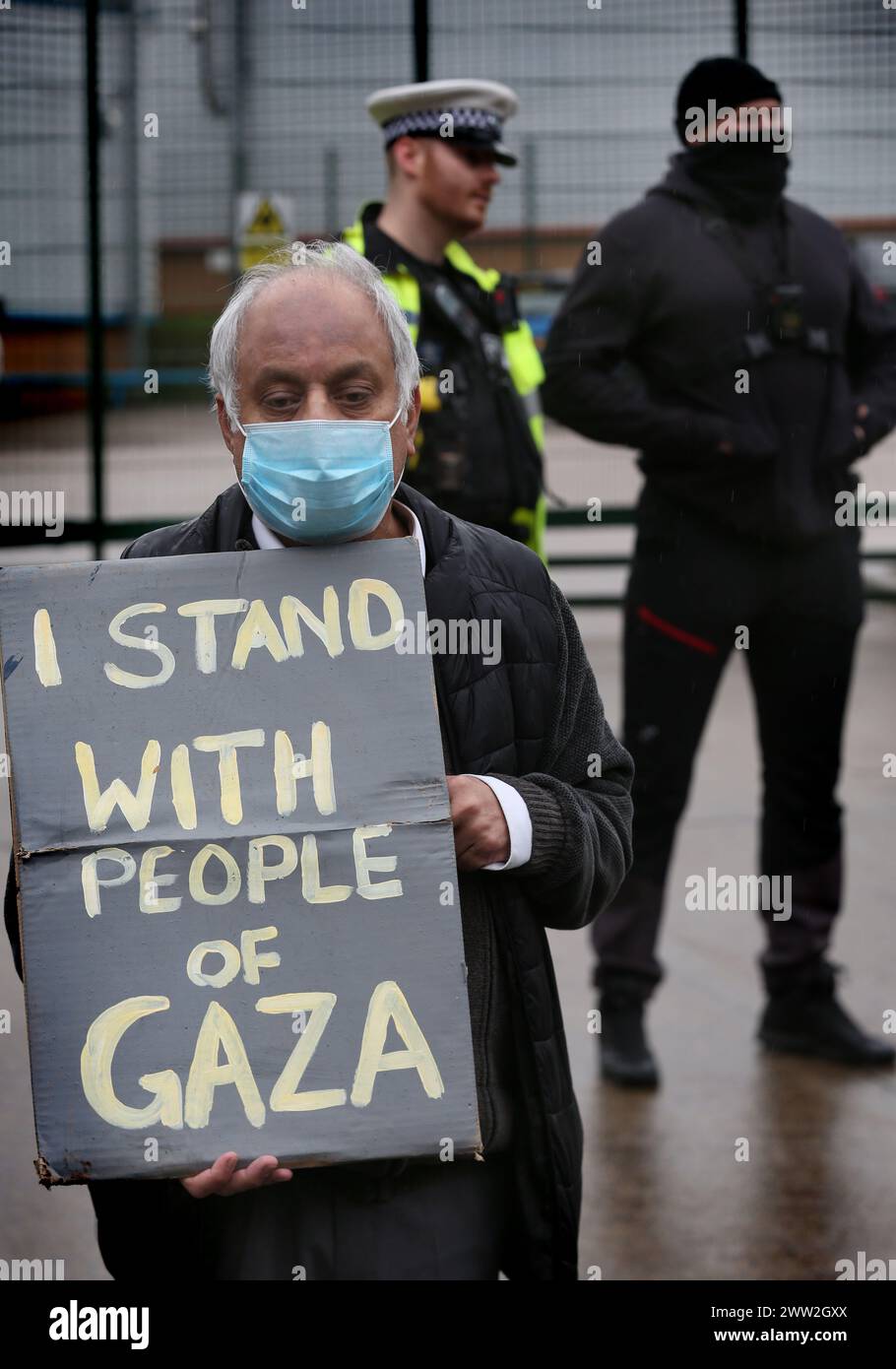 A protester hold a sign saying ‘I Stand With People of Gaza' outside ...