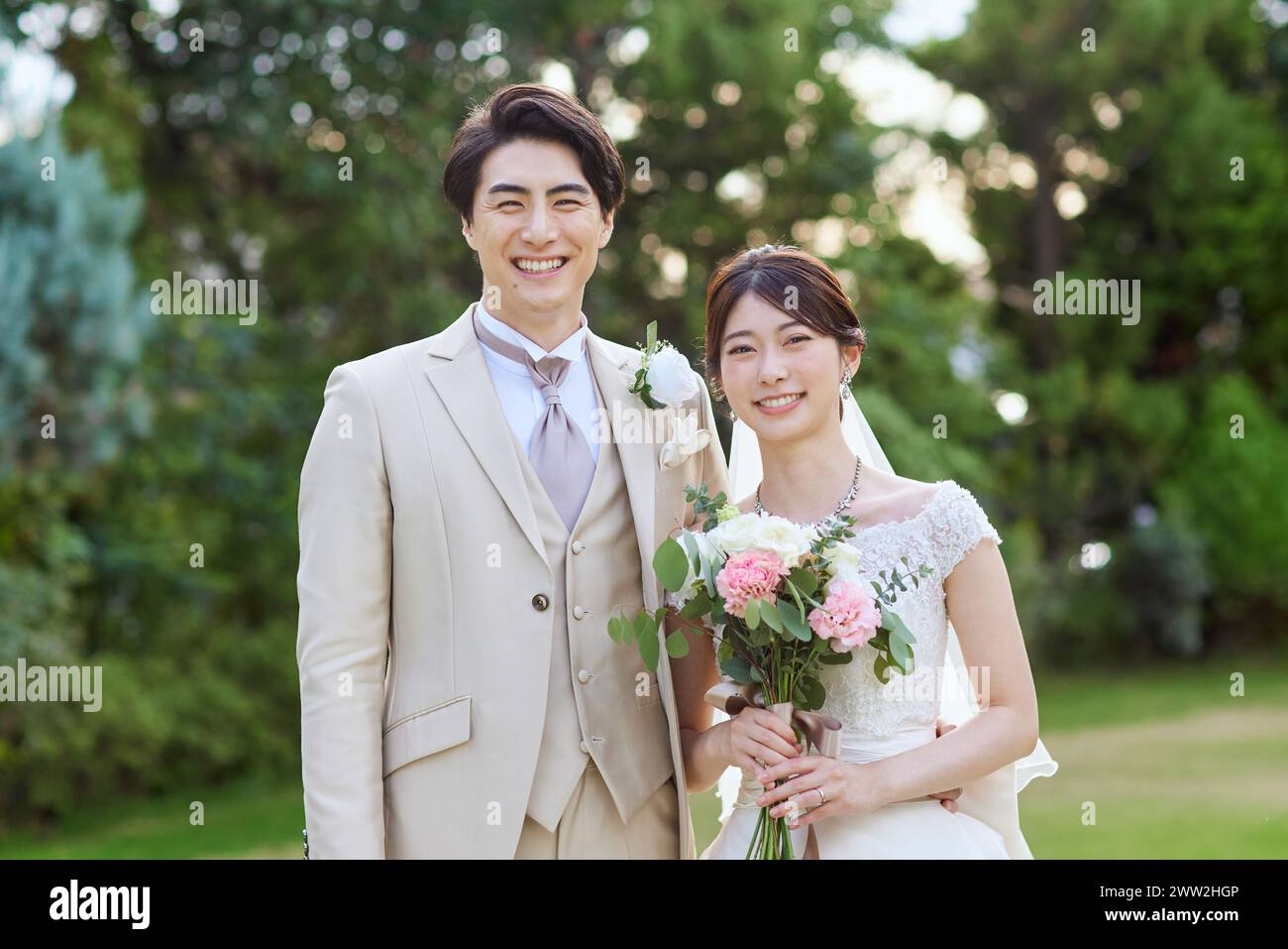 Happy asian couple standing hi-res stock photography and images - Alamy