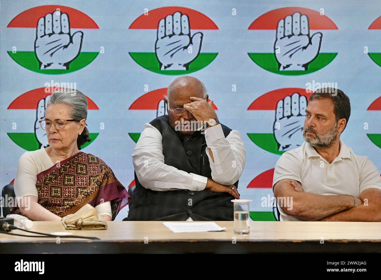 Congress party president Mallikarjun Kharge, center, flanked by senior ... Congress party president Mallikarjun Kharge, center, flanked by senior ...