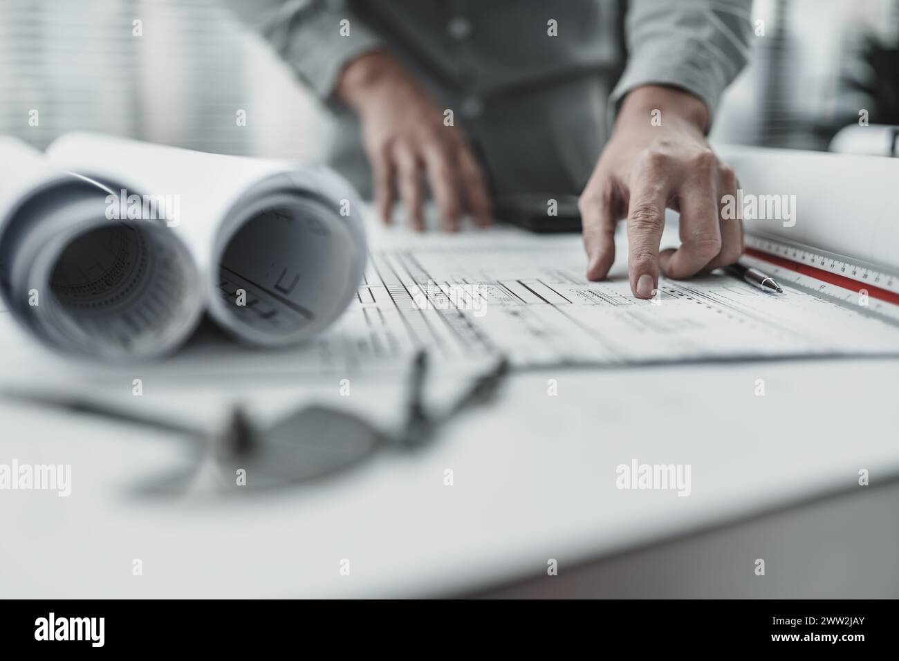 Architect engineer read drawing design working on blueprint. House ...