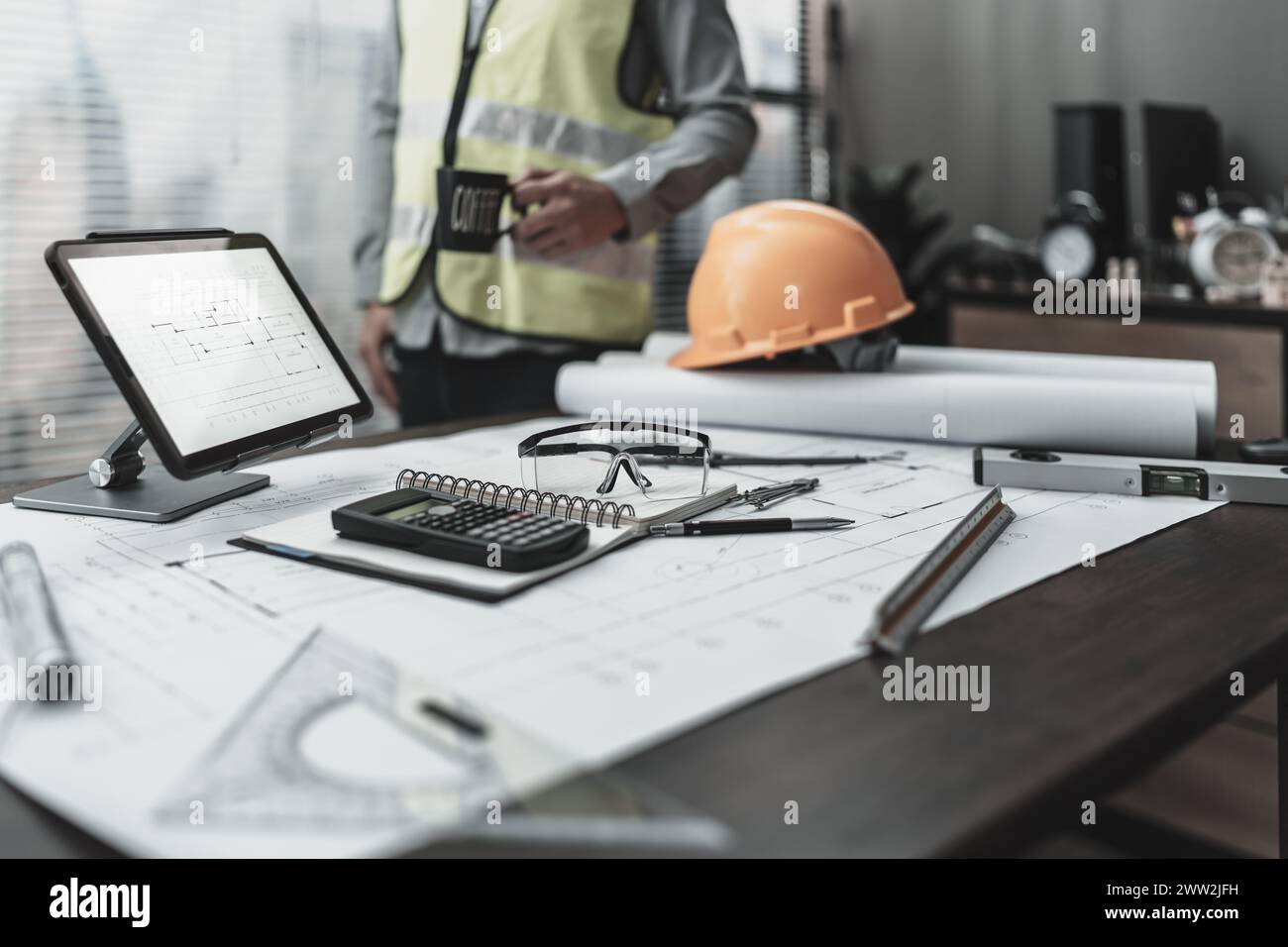 Calculator, triangle ruler, safety glasses, compass, vernier caliper on ...