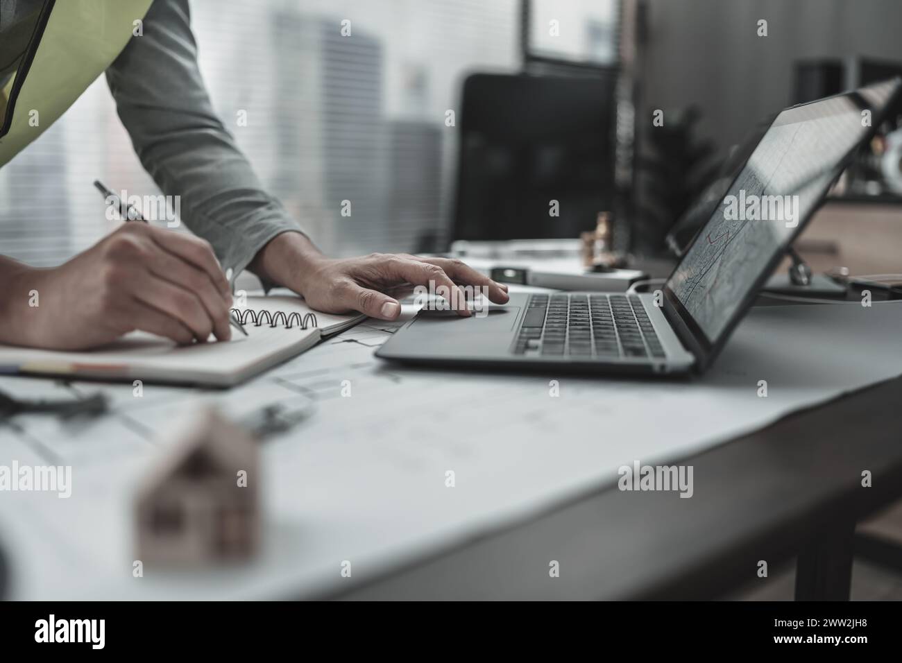Engineering working with laptop inspection on the office desk. Engineer ...