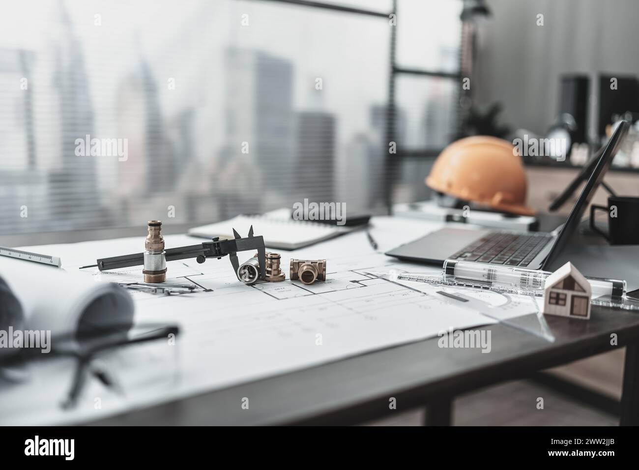 Engineering working with drawings inspection on the office desk safety ...