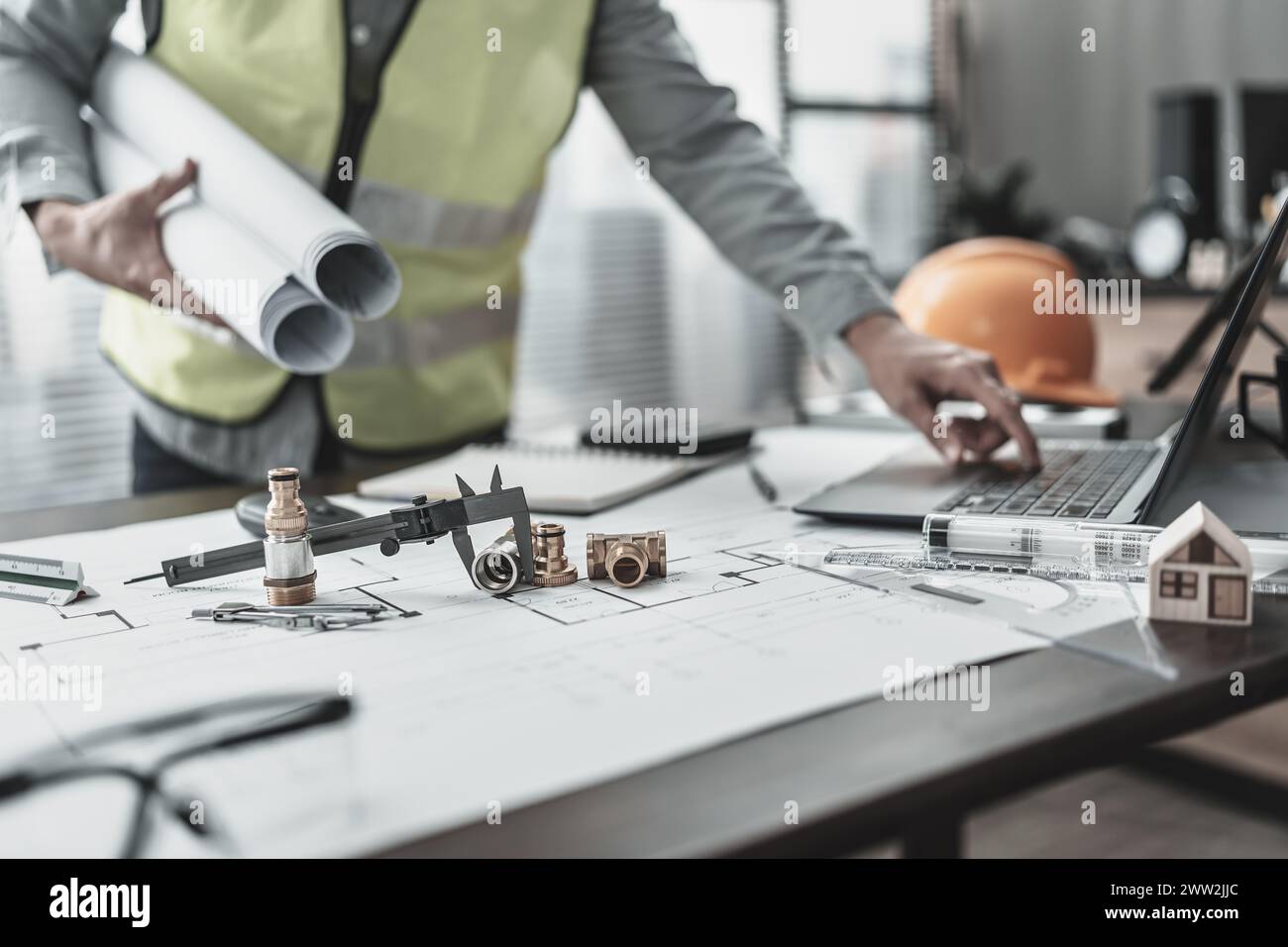 Engineering working with drawings inspection on the office desk safety ...