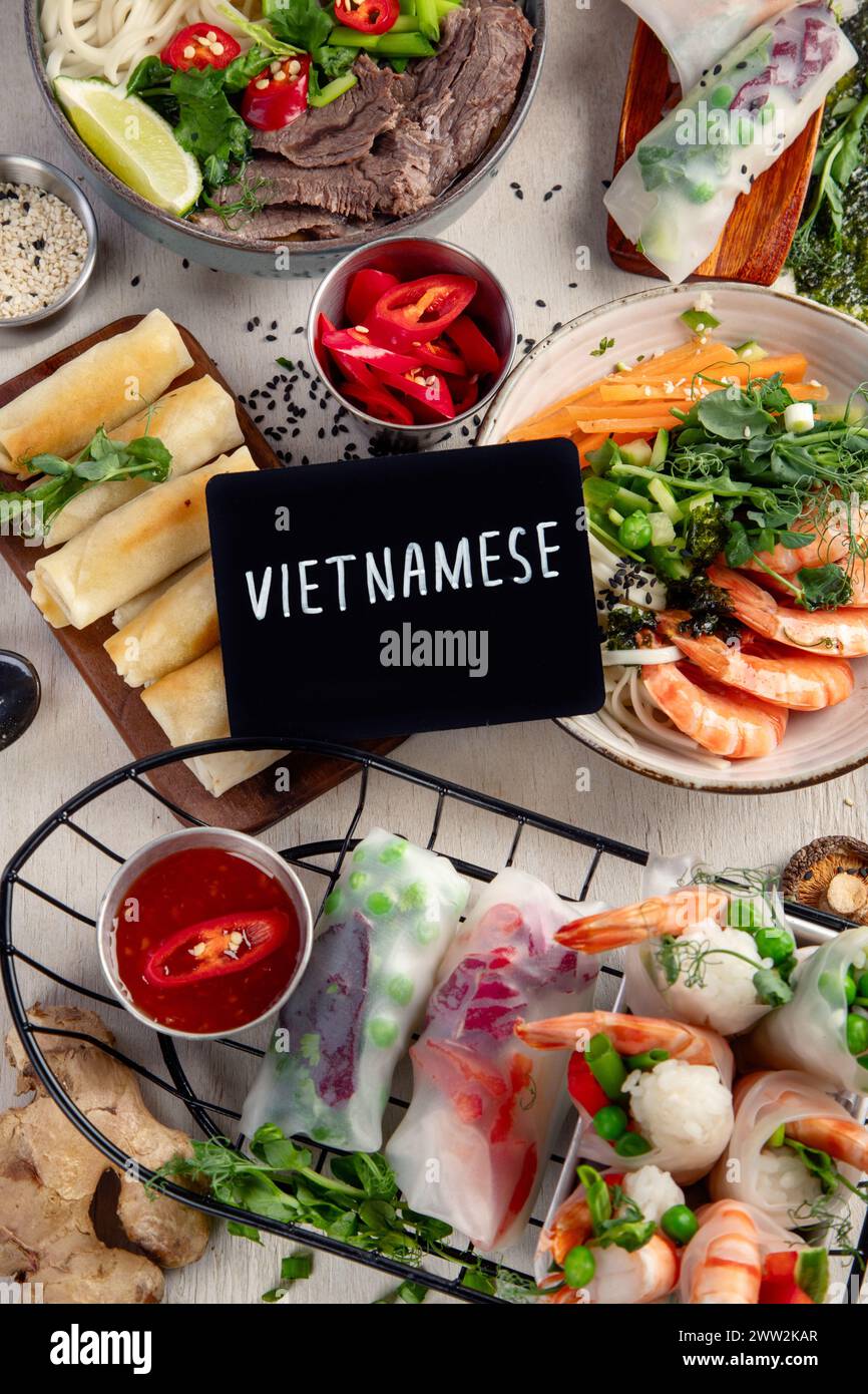 Assorted asian meal, vietnamese food. Pho bo, noodles, spring rolls ...