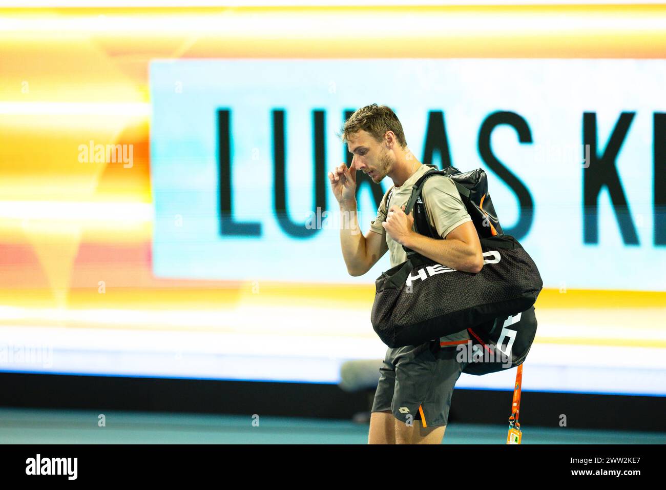 MIAMI GARDENS, FLORIDA - MARCH 20: Lukas Klein of Slovakia enters the court on Day 5 of the ...