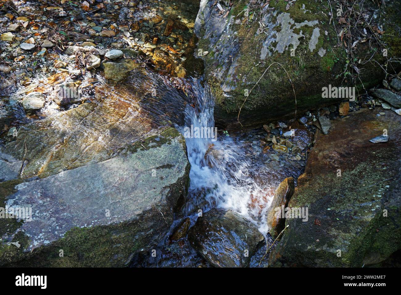 Natural landscape of green mountain range with waterfall along trekking ...