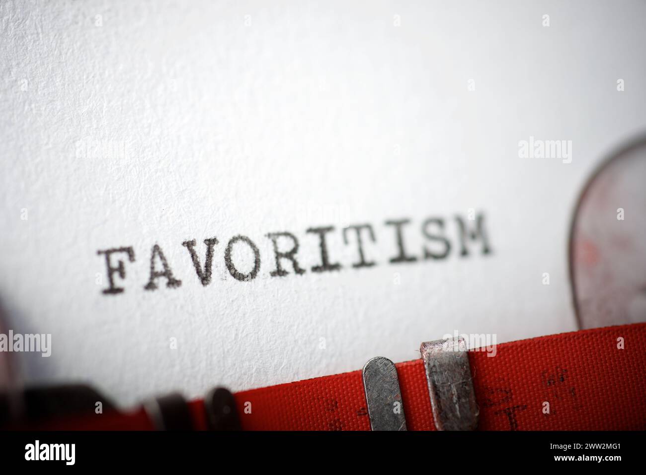 Favoritism word written with a typewriter Stock Photo - Alamy