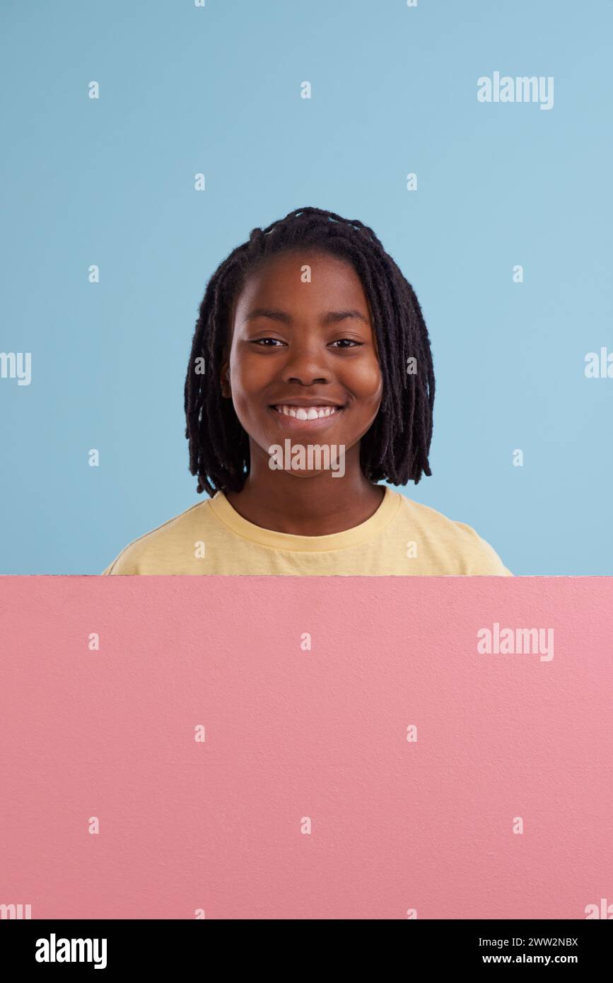 Portrait, banner or happy boy child with mockup in studio for ...