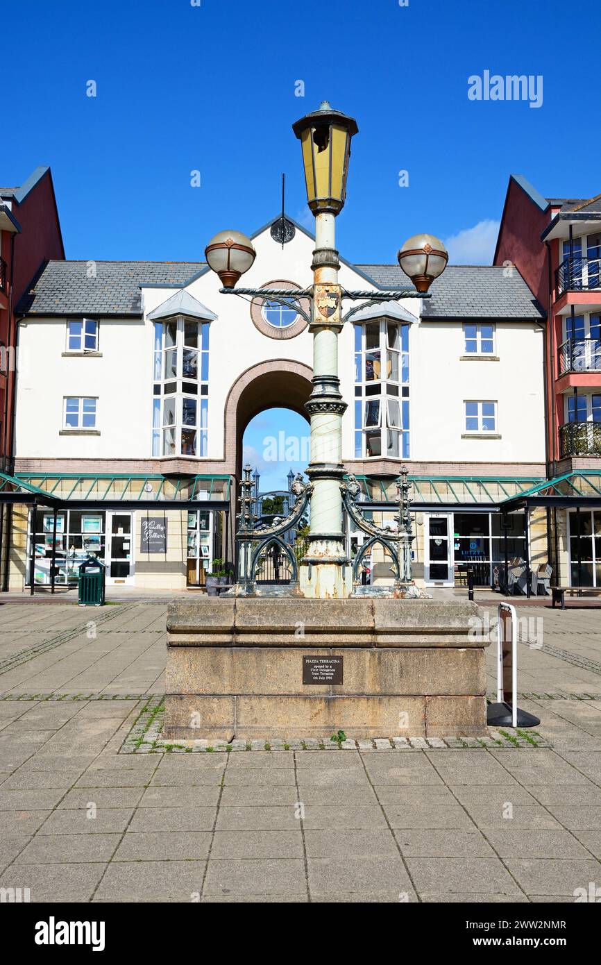Old streetlight in the Piazza Terracina with buildings to the rear ...