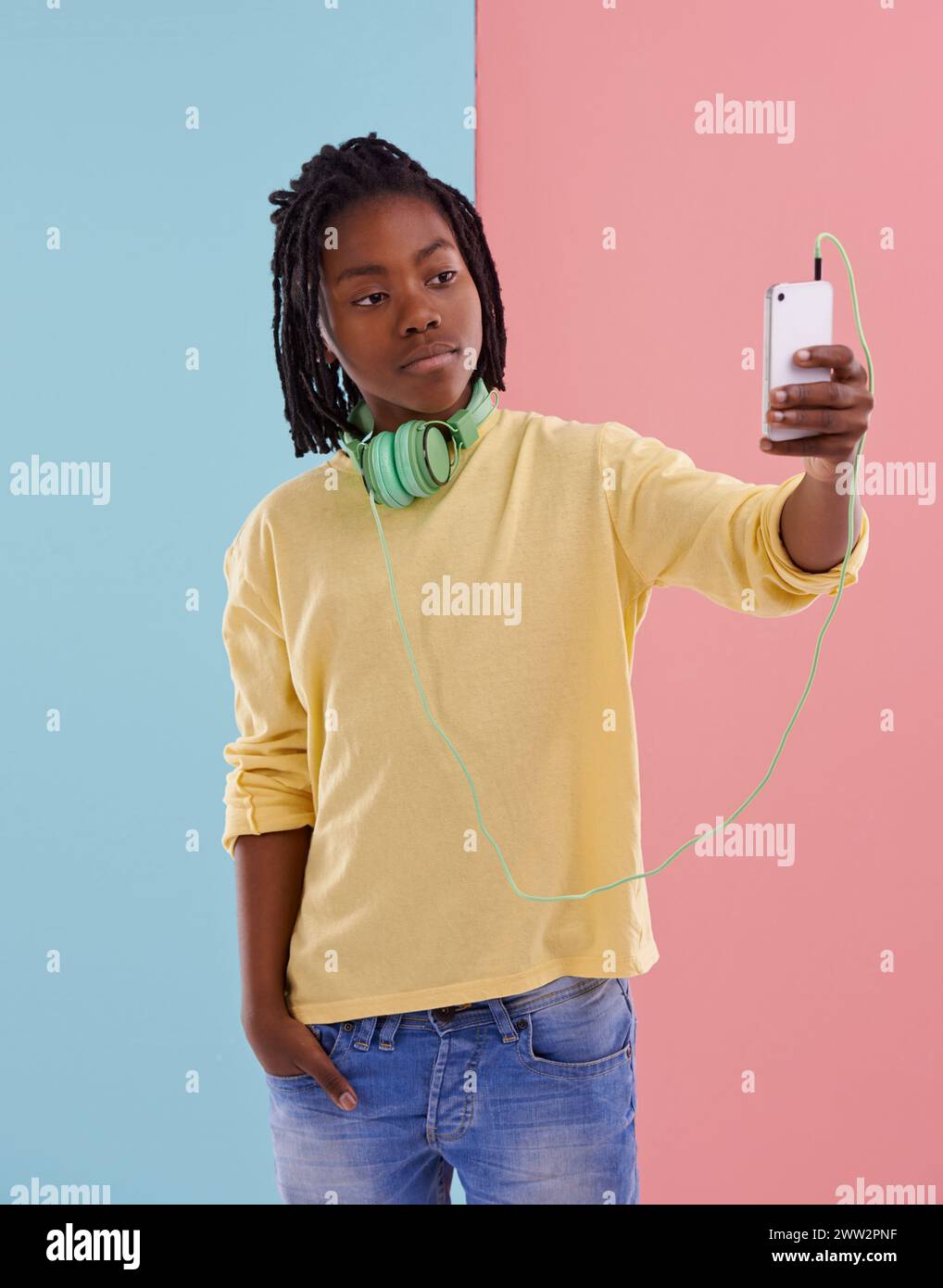 Teen, boy and selfie of student in studio with headphones for listening ...