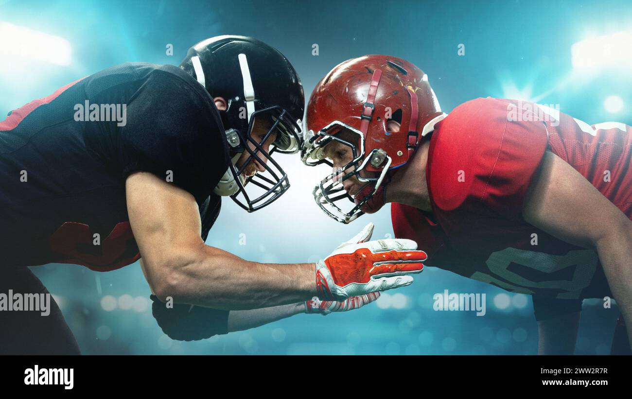Two American football players in helmets confronting each other with ...