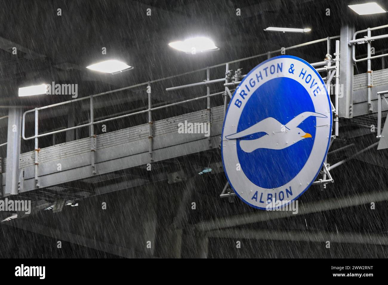Rain falls on an illuminated Brighton and Hove Albion sign - Brighton ...