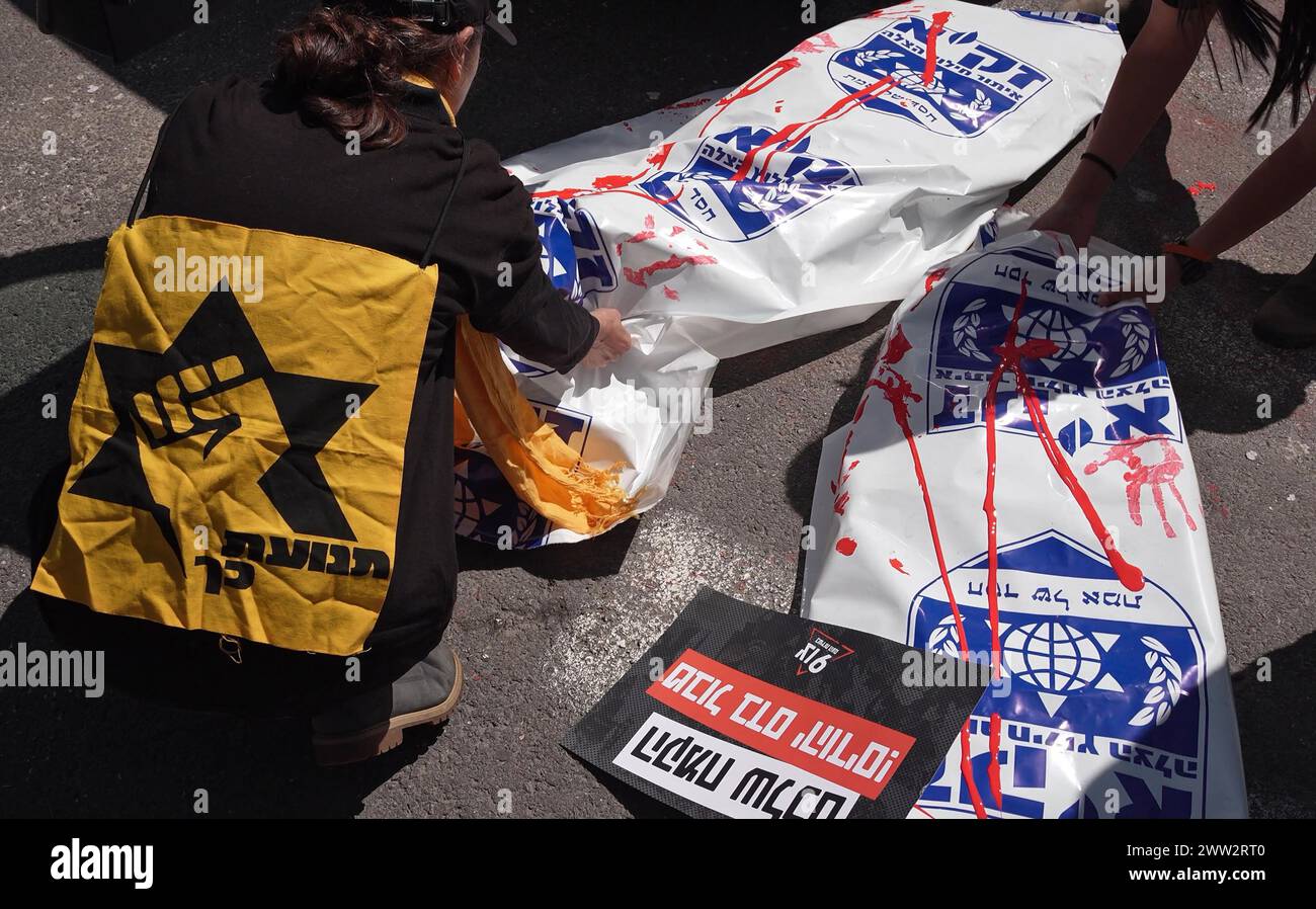 A protestor wearing the symbol of the Jewish ultra-nationalist Kach ...